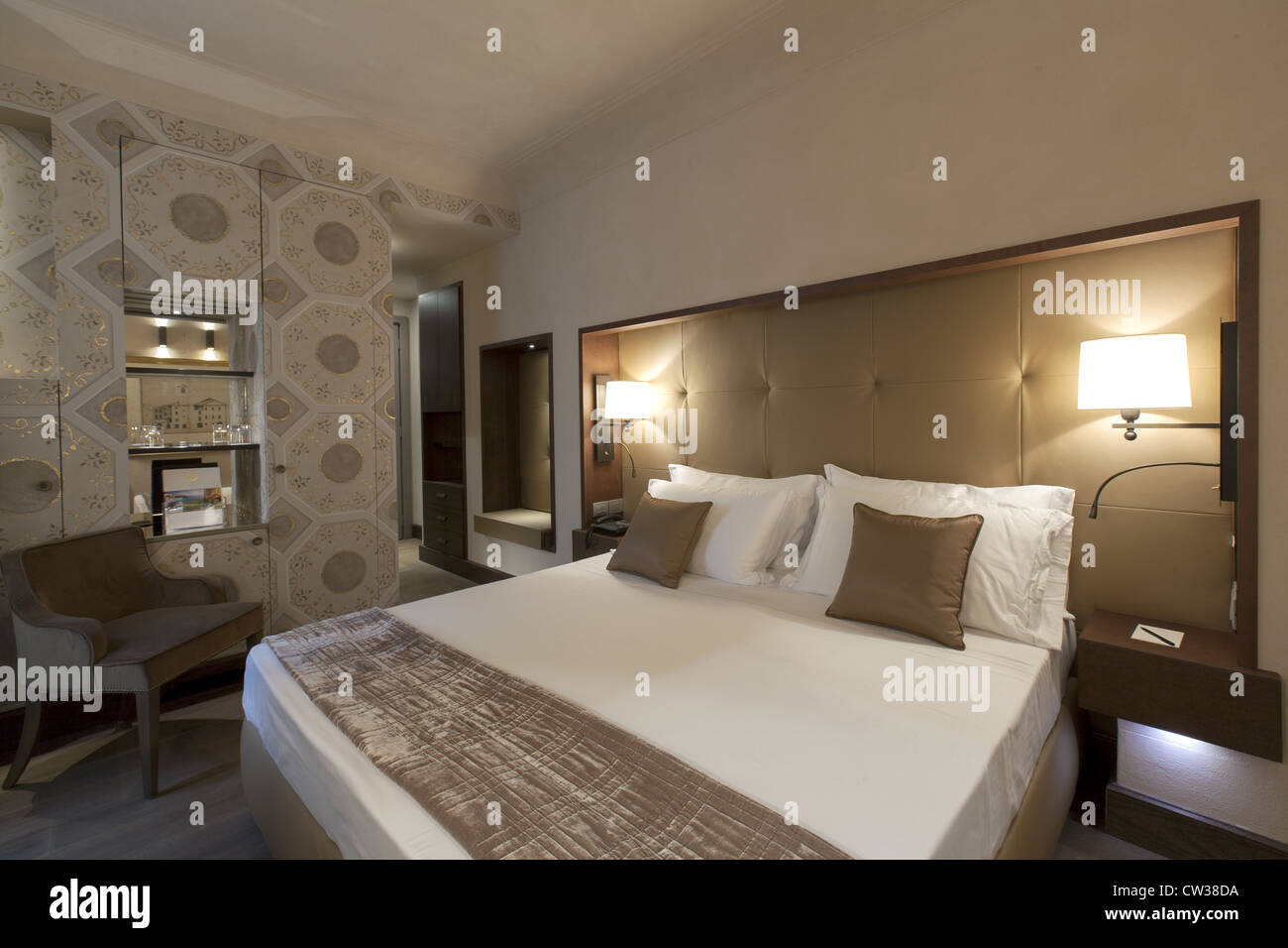 Bed room in a classic italian elegant hotel Stock Photo - Alamy