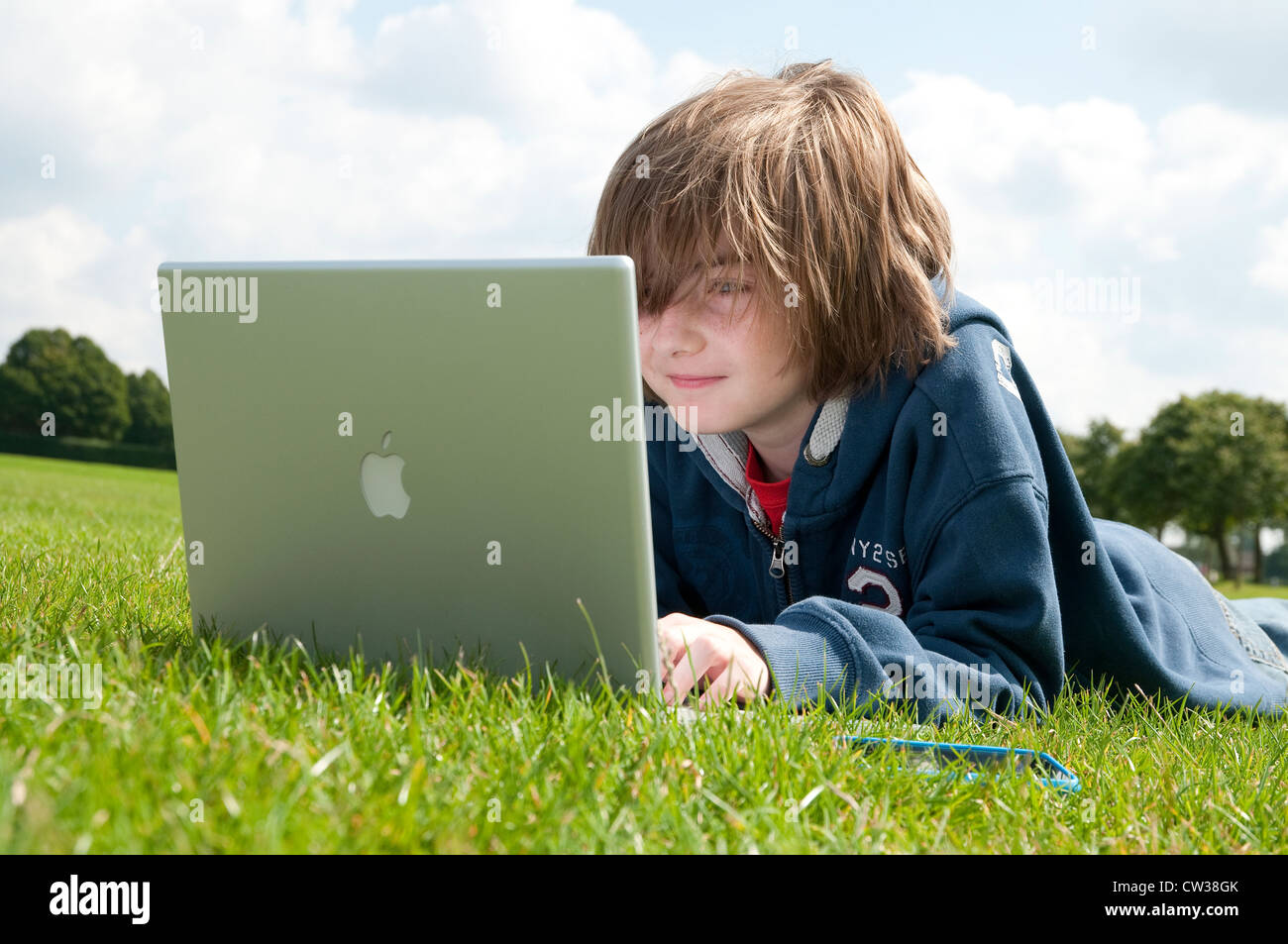 Teenage boy watching computer screen hi-res stock photography and ...