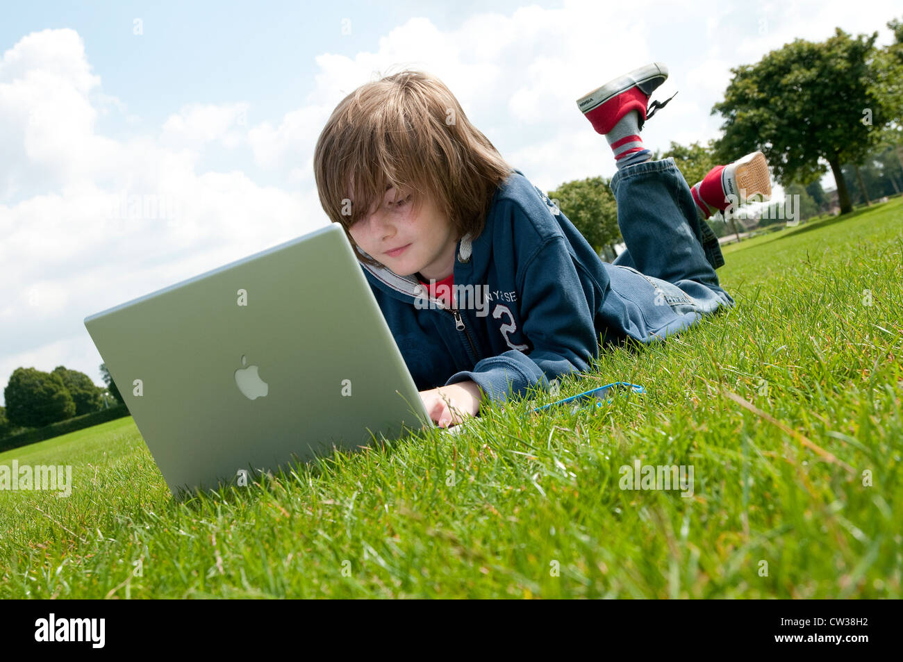 Teenage boy watching computer screen hi-res stock photography and ...