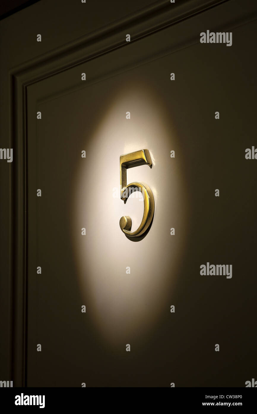 hotel room number five 5 written on a door Stock Photo - Alamy