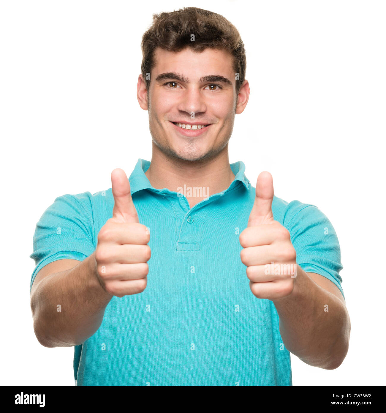 Smiling young man in front of white background Stock Photo - Alamy