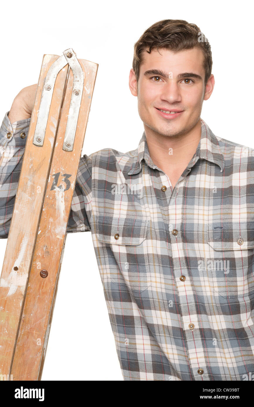Smiling man with ladder in front of white background Stock Photo - Alamy