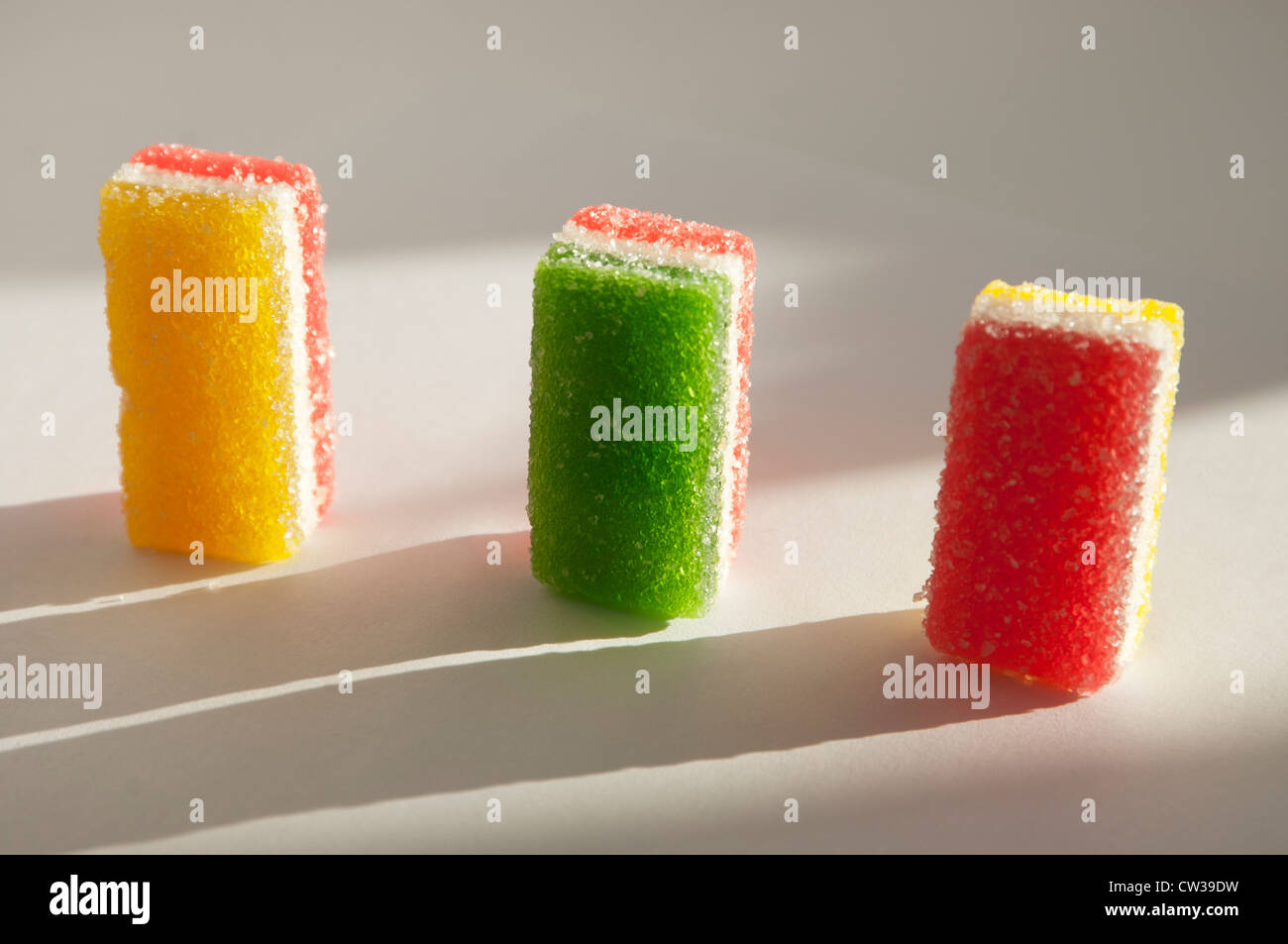 Different fruit-paste candies on a white paper in a sunlight Stock ...