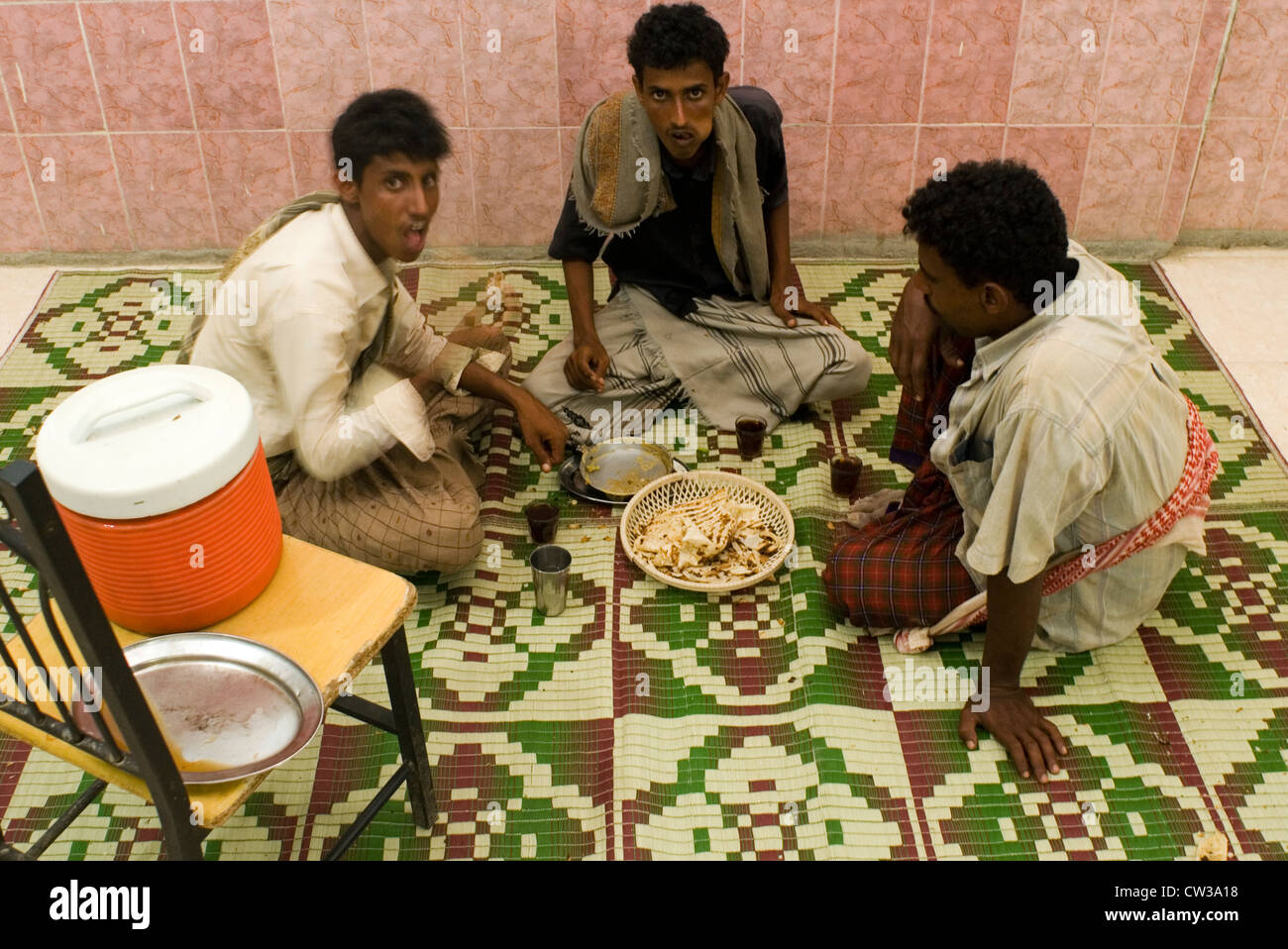 Three men eating in a Restaurant of Hadibo, Socotra Island, Yemen ...