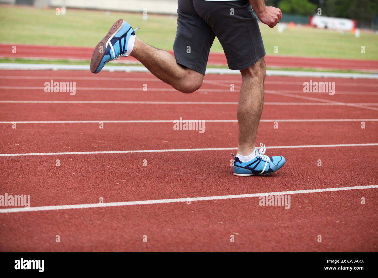 lower half of runners on a race track Stock Photo - Alamy