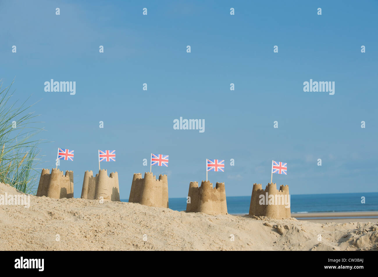 Union Jack flags in sandcastles on a sand dune. Wells next the sea ...