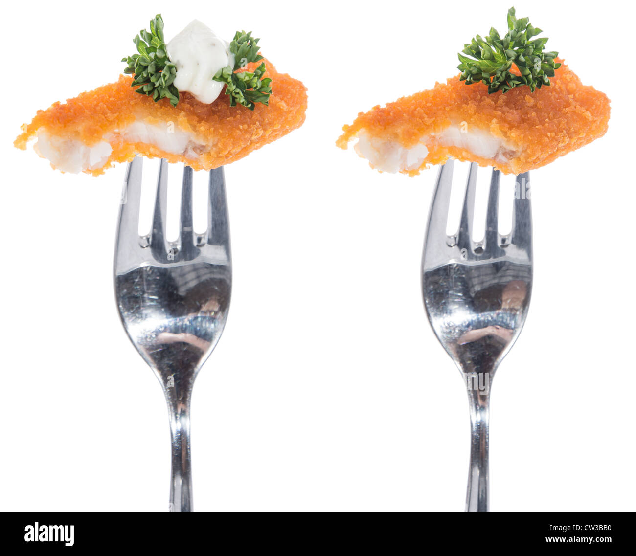 Pieces of fried Fish on a fork isolated on white Stock Photo - Alamy