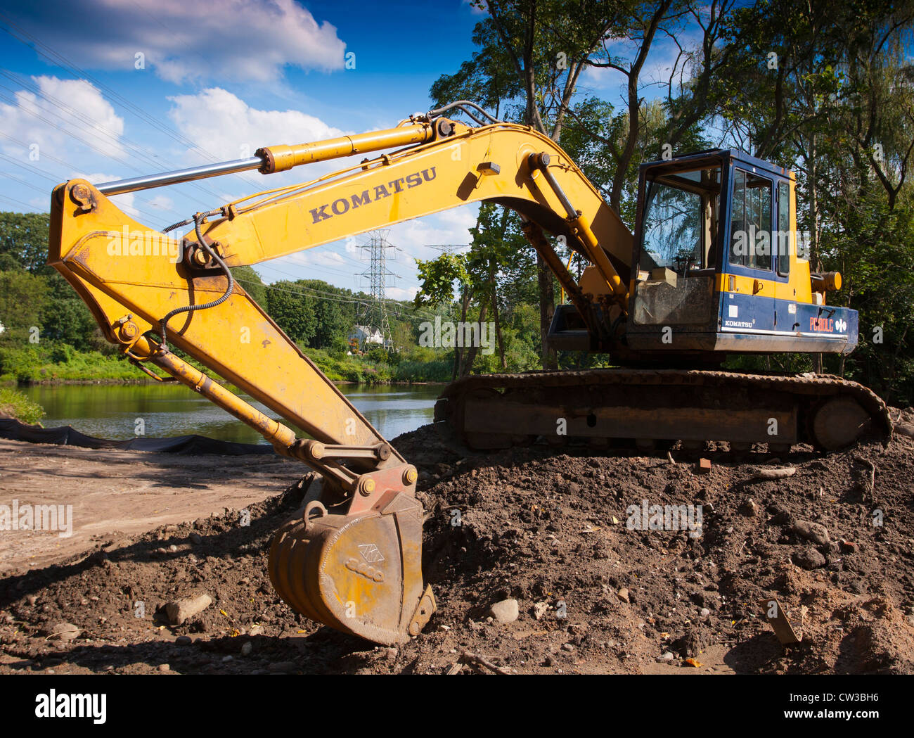 A backhoe at a construction site Stock Photo - Alamy