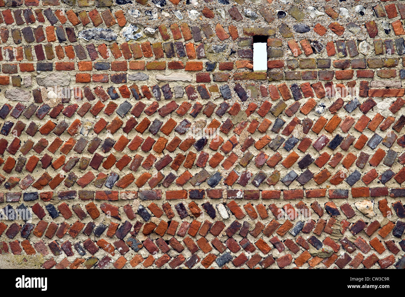 Mixed brick and stonework wall at the old Rathfinny farmhouse near ...