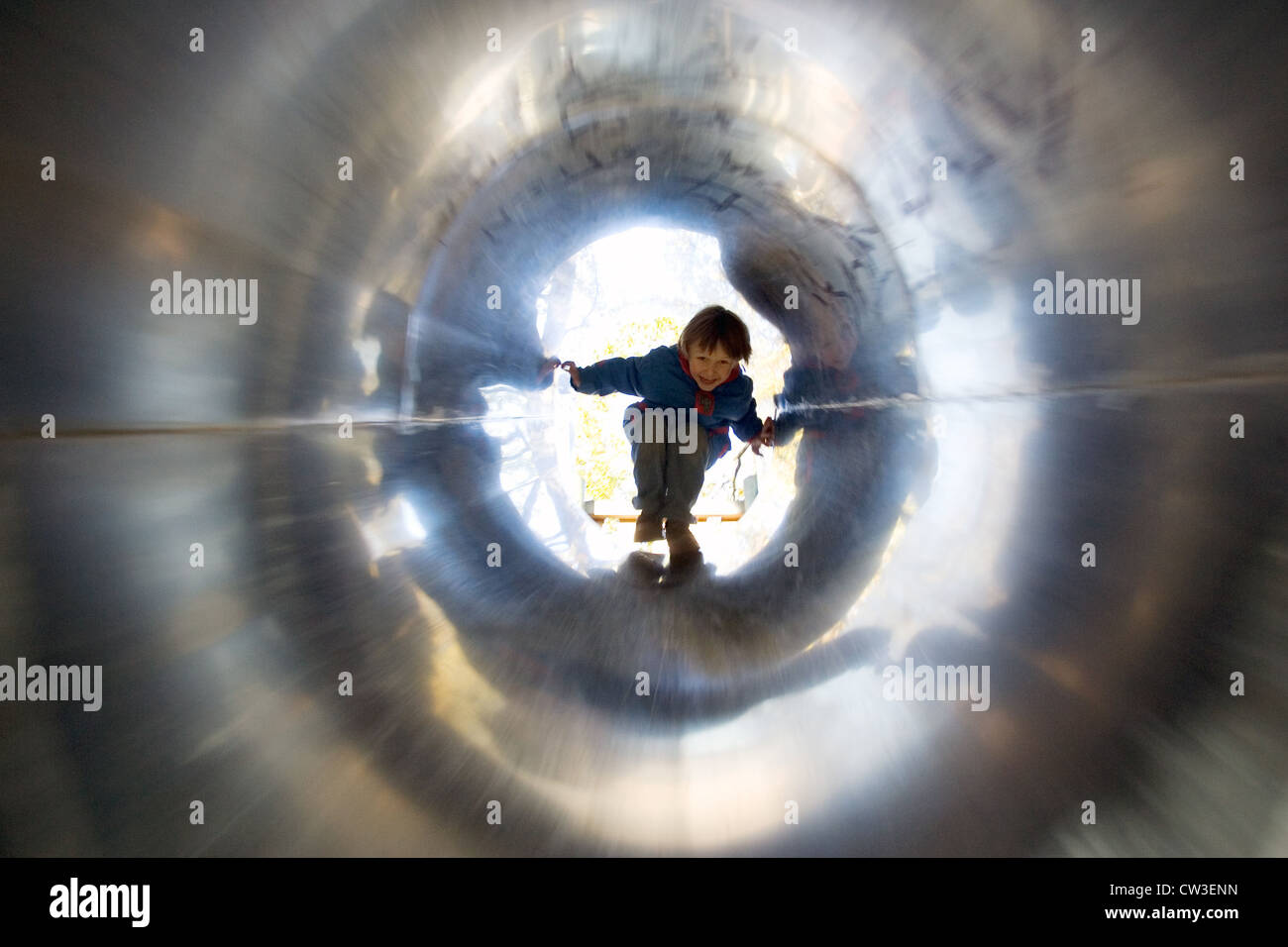 Berlin, a child climbs up a slide Stock Photo - Alamy