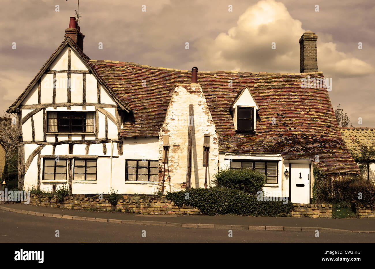 The Old Crooked Cottage Stock Photo - Alamy