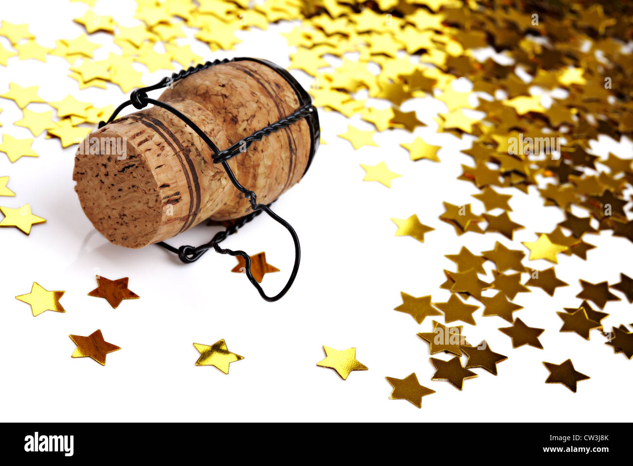 Confetti and champagne cork Stock Photo - Alamy
