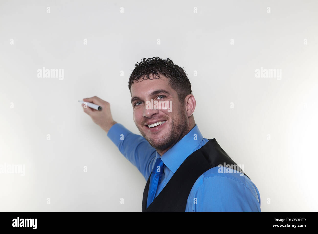 handsome male writing something in the air Stock Photo - Alamy