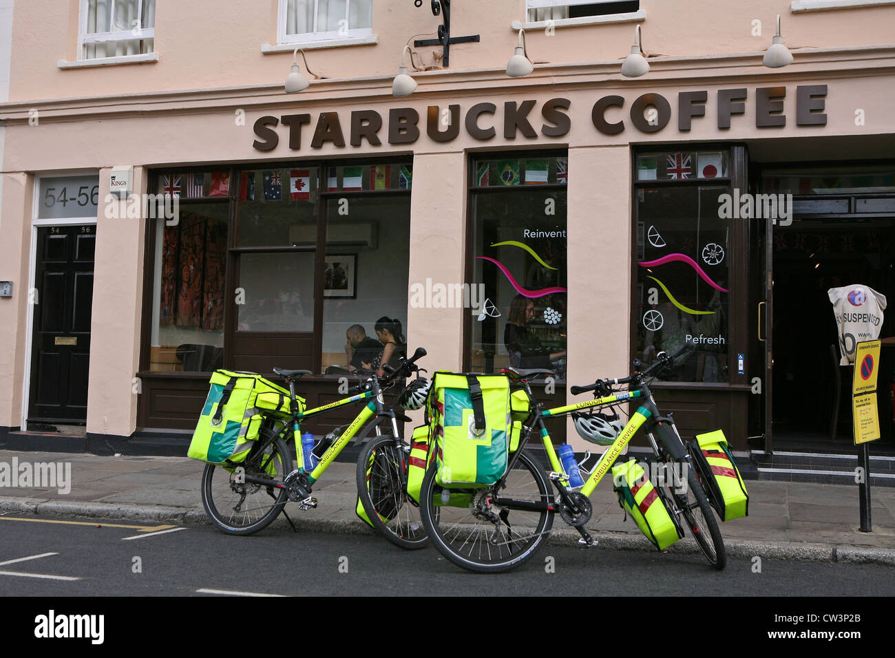 London Ambulance Service bikes outside Starbucks coffee shop in ...
