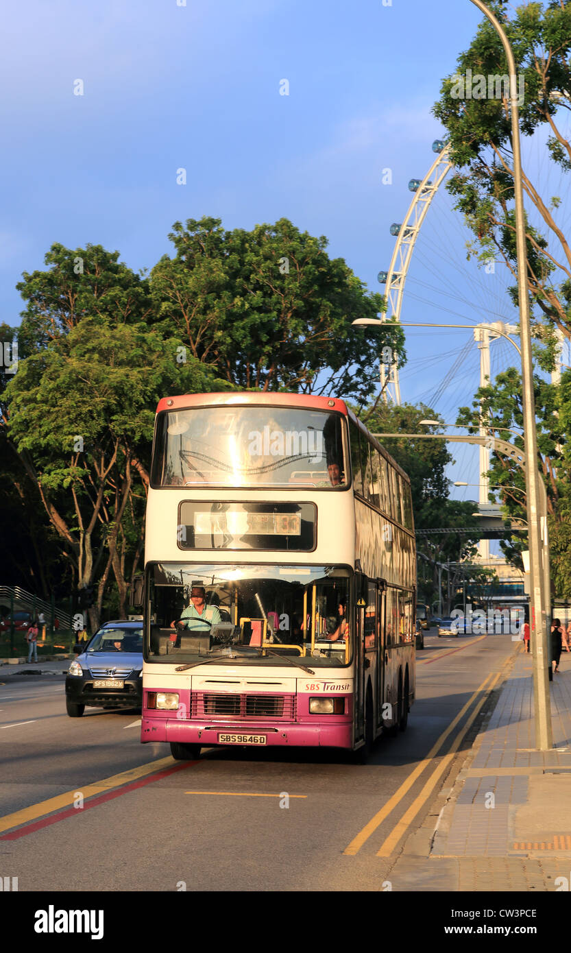 Double decker bus on Raffles Avenue in Singapore with the Singapore ...