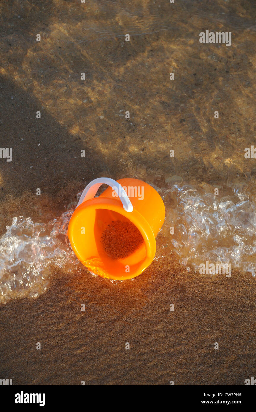 bucket on the sea side Stock Photo - Alamy