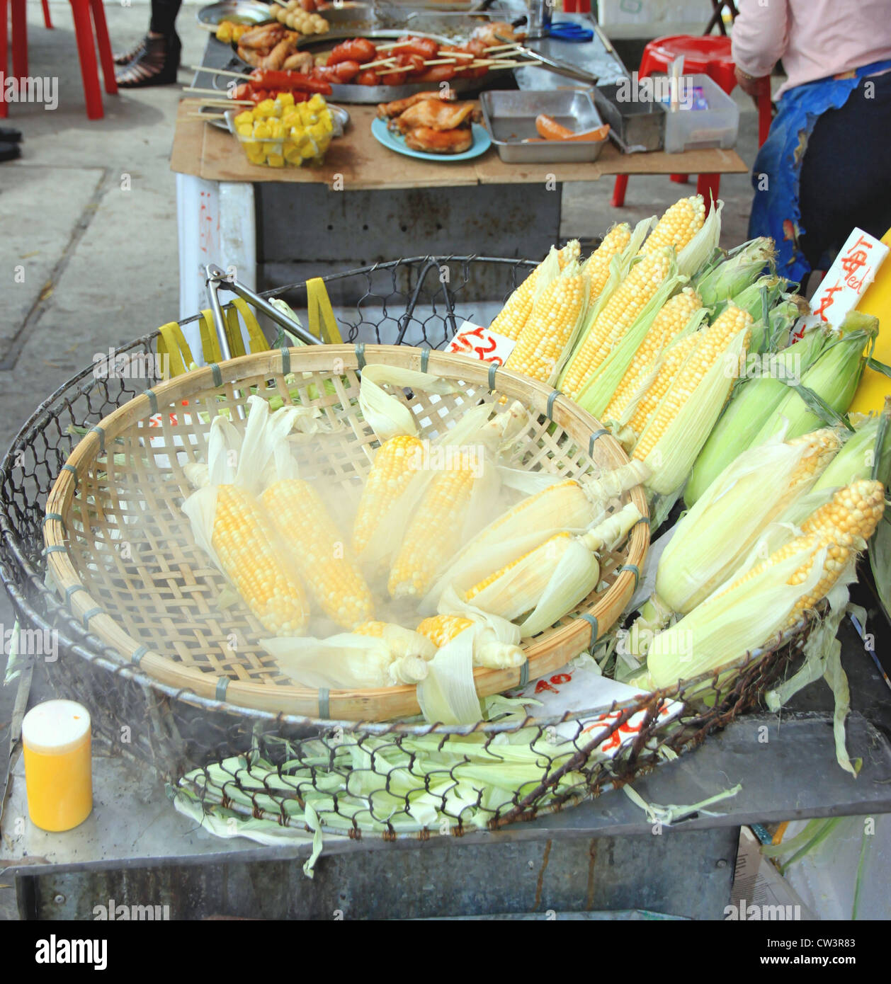 Corn cobs at a Chinese street market Stock Photo - Alamy
