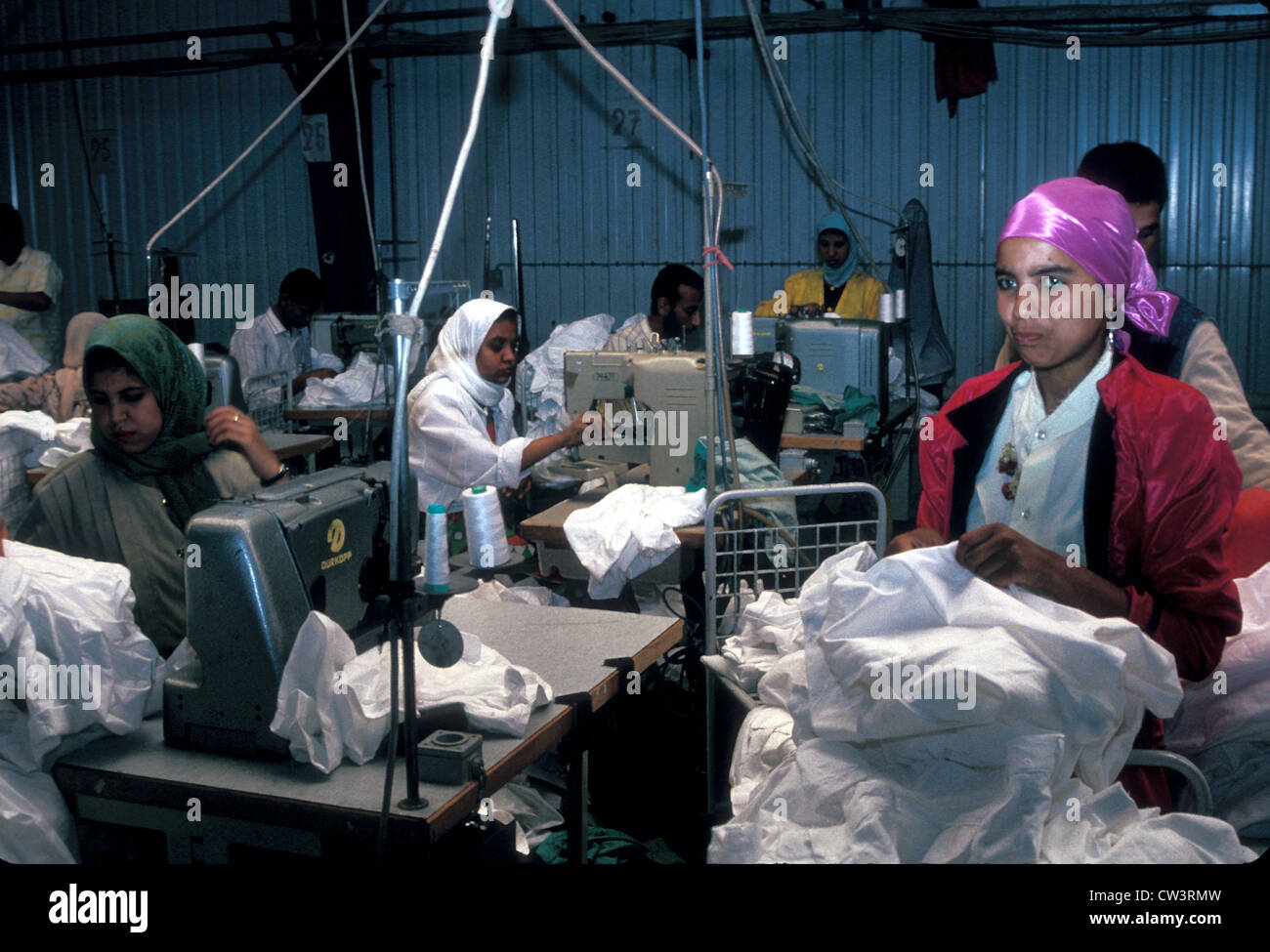 Women machinists in a cotton textile factory in Egypt Stock Photo - Alamy