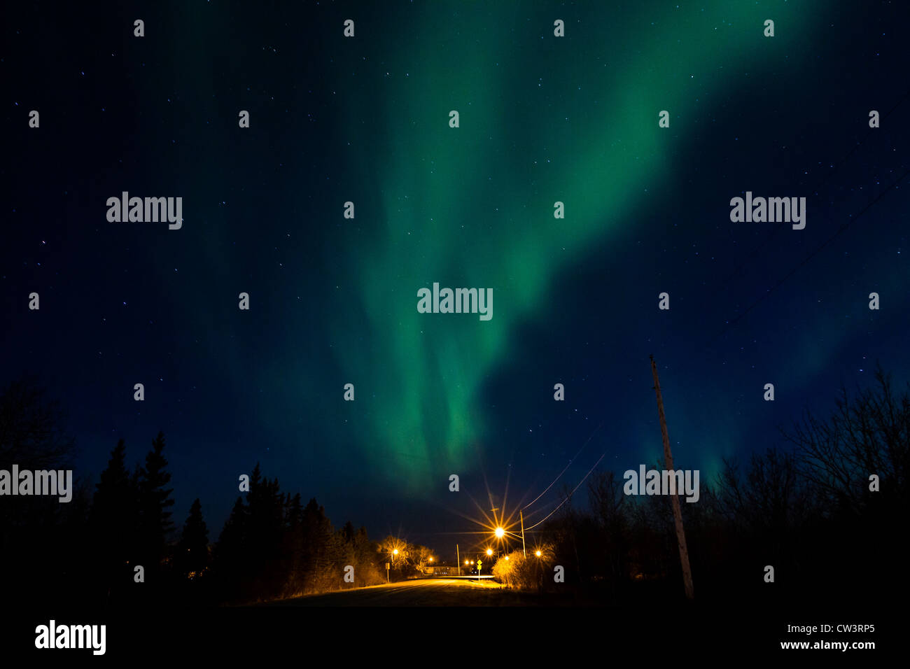 Northern lights dancing in the night sky on a cold night Stock Photo ...