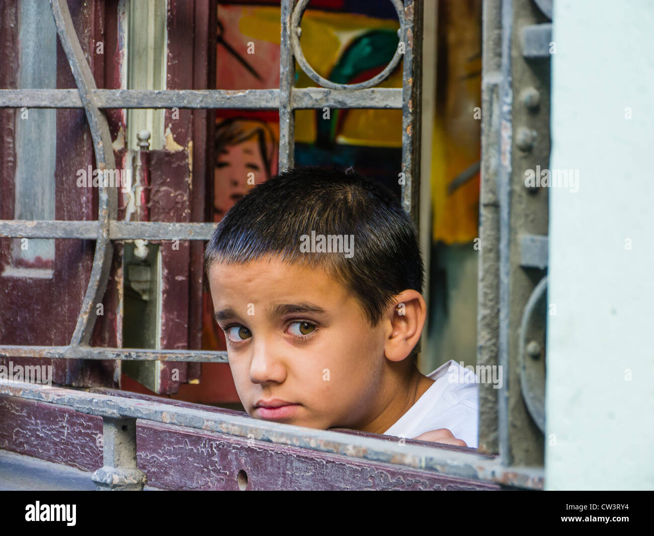 Peering out window street hi-res stock photography and images - Alamy