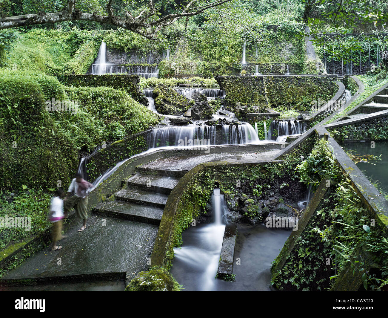 The sacred water temple of Pura Mengening. The waters here flow down ...