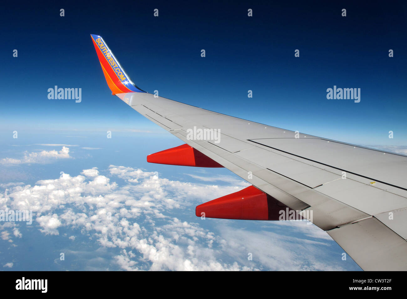 View of a clear blue sky above and white clouds below from a Southwest ...