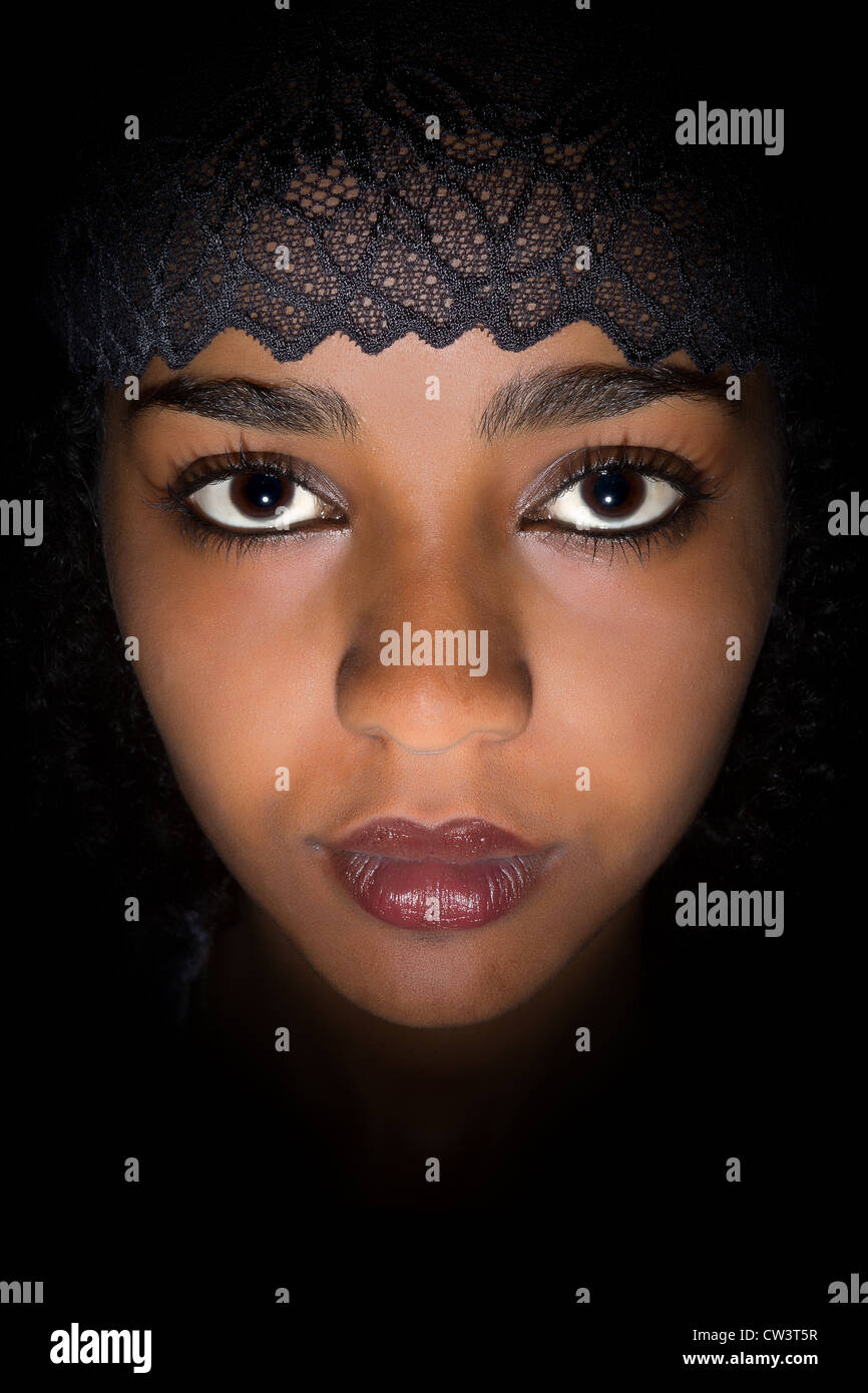 Young Ethiopian woman with stunning eyes wearing black lace Stock Photo ...
