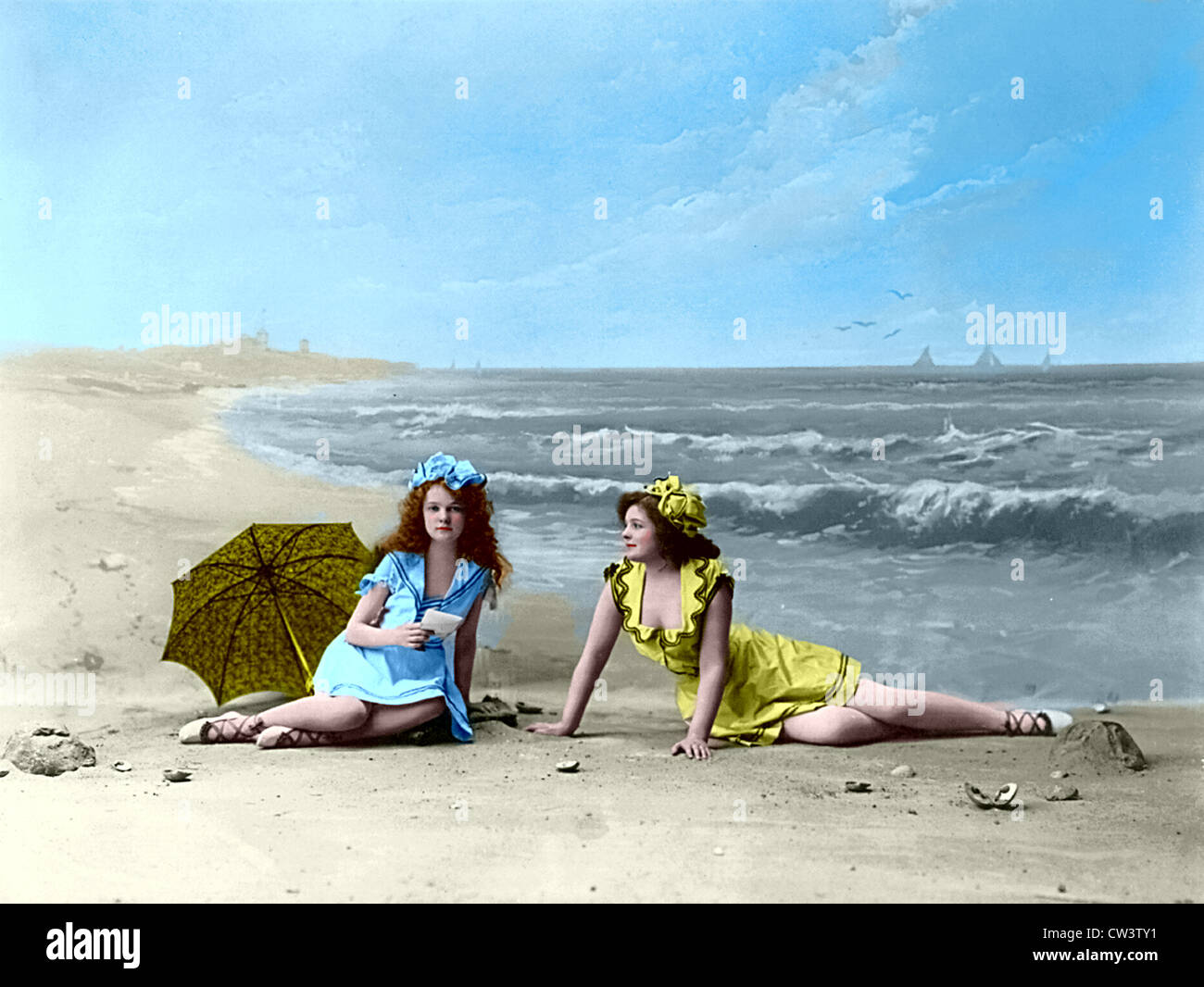 Read on holiday by the sea Stock Photo - Alamy