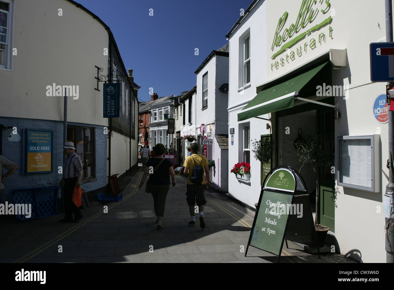 street scene of padstow, cornwall, uk showing chough bakery and pucelli ...