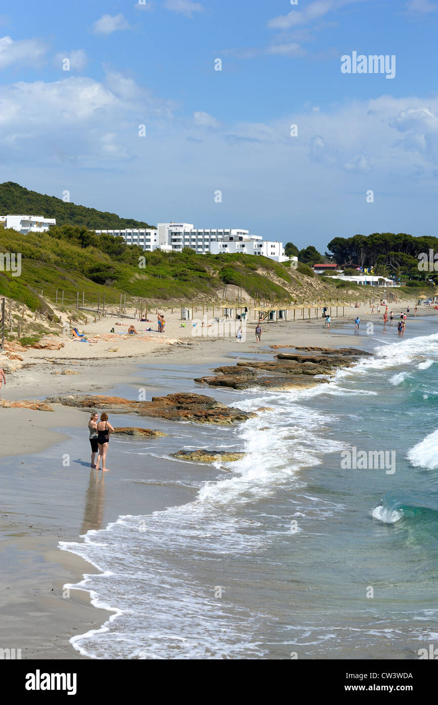 Beach in santo Tomas menorca spain with the hotel victoria playa in the ...