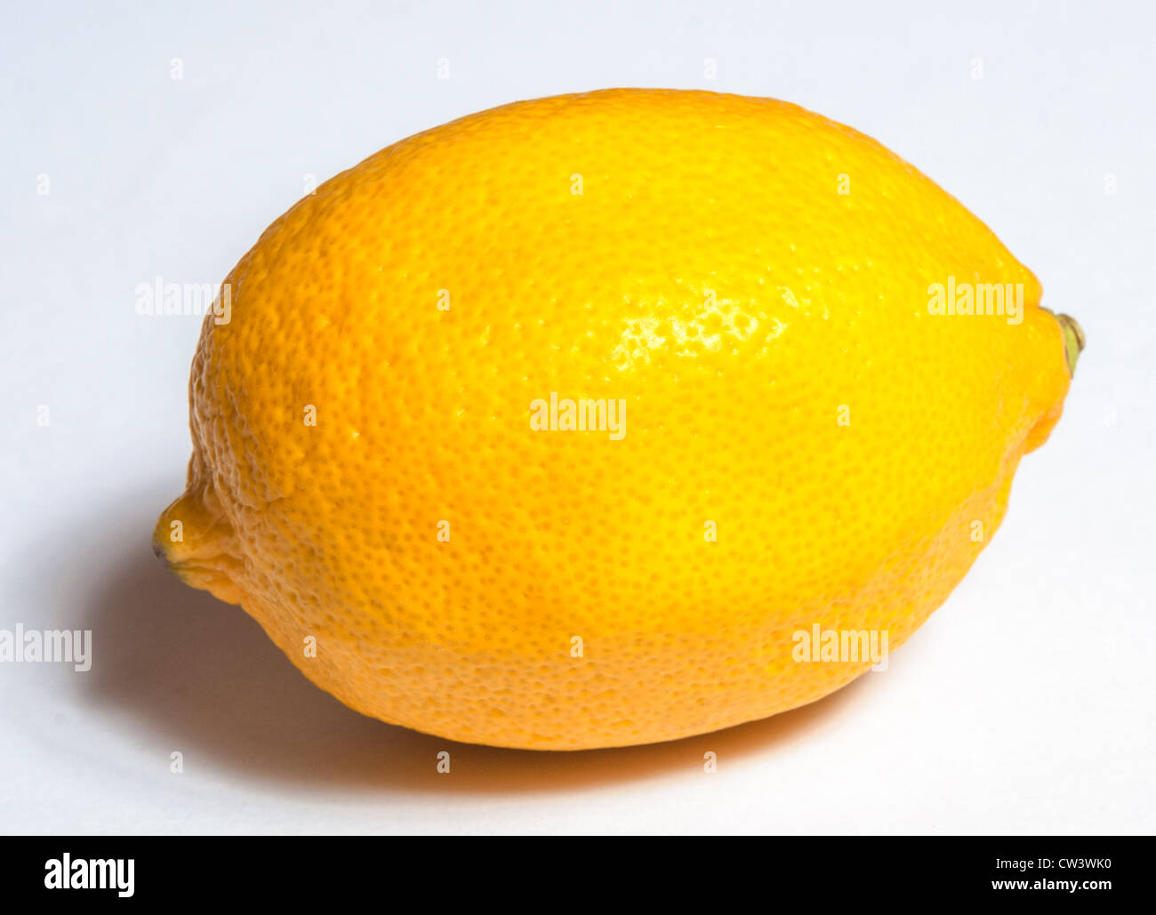 Whole lemon on white background Stock Photo - Alamy