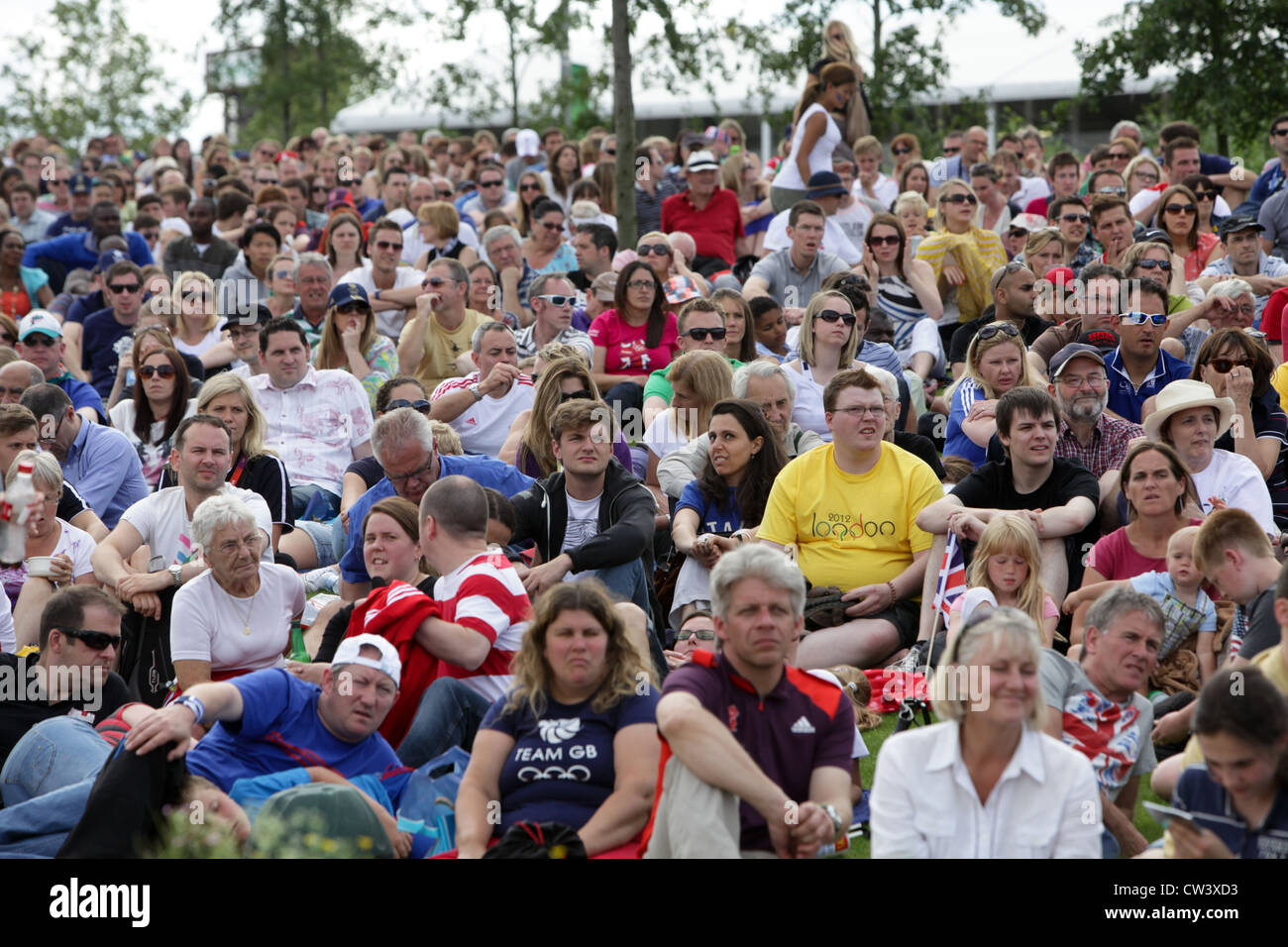 SPECTATORS WATCHING THE BIG TV SCREEN AT THE OLYMPIC GAMES LONDON 2012 ...