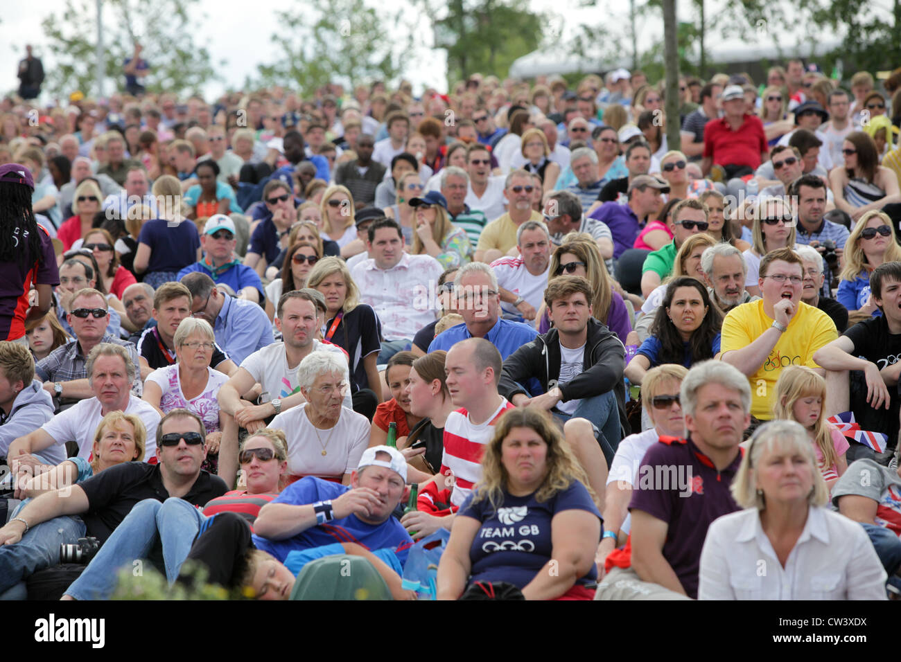 SPECTATORS WATCHING THE BIG TV SCREEN AT THE OLYMPIC GAMES LONDON 2012 ...