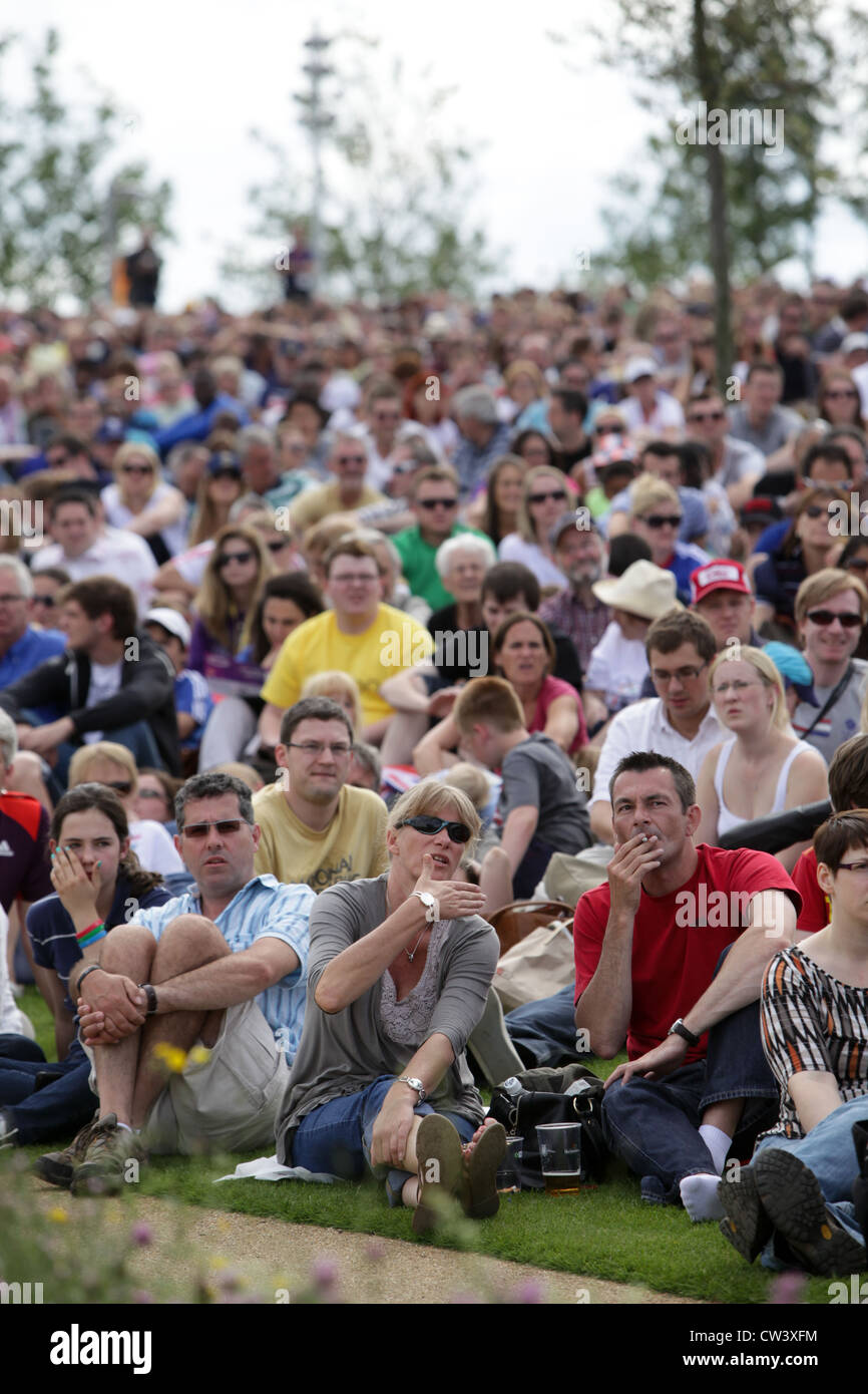 SPECTATORS WATCHING THE BIG TV SCREEN AT THE OLYMPIC GAMES LONDON 2012 ...