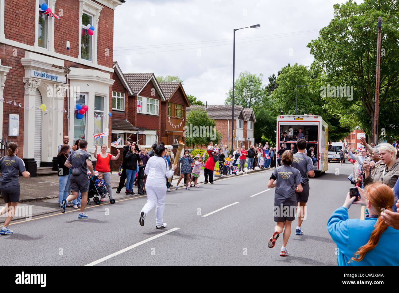 2012 olympic torch bearer hi-res stock photography and images - Alamy