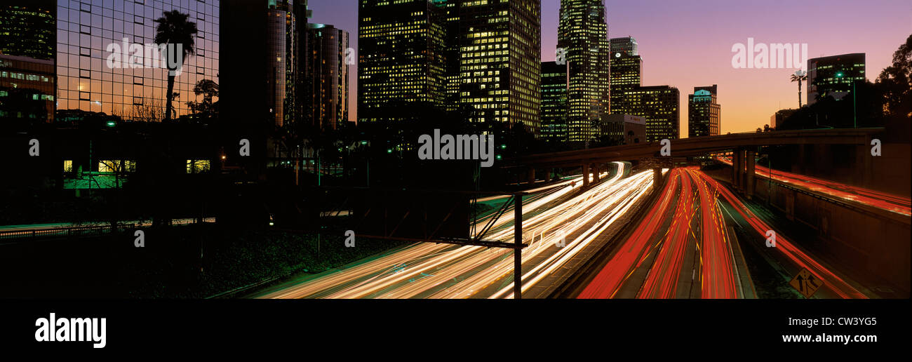 This Harbor Freeway with rush hour traffic sunset. yellow and red ...