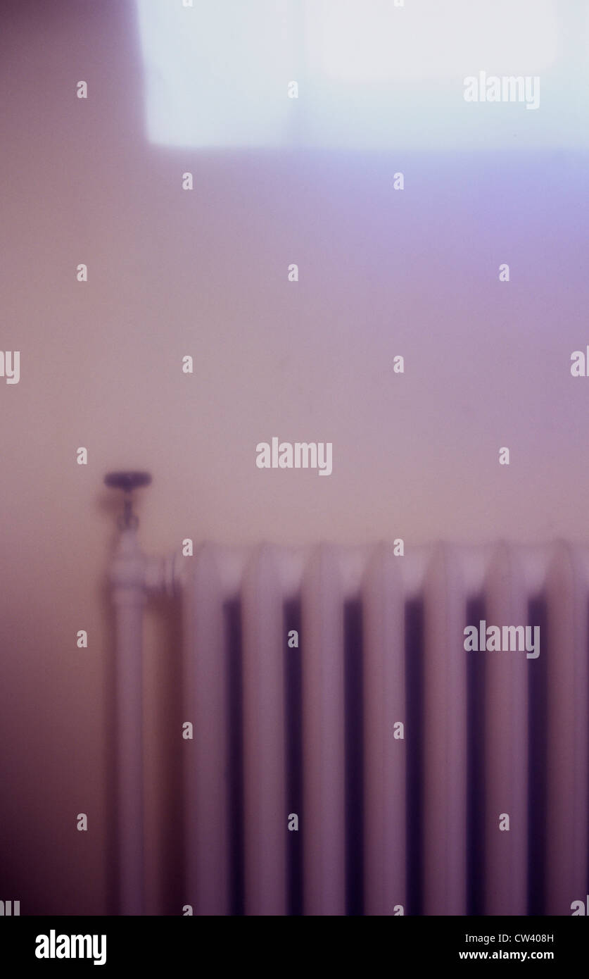 UK England Norfolk Atmospheric detail old-fashioned room radiator with ...