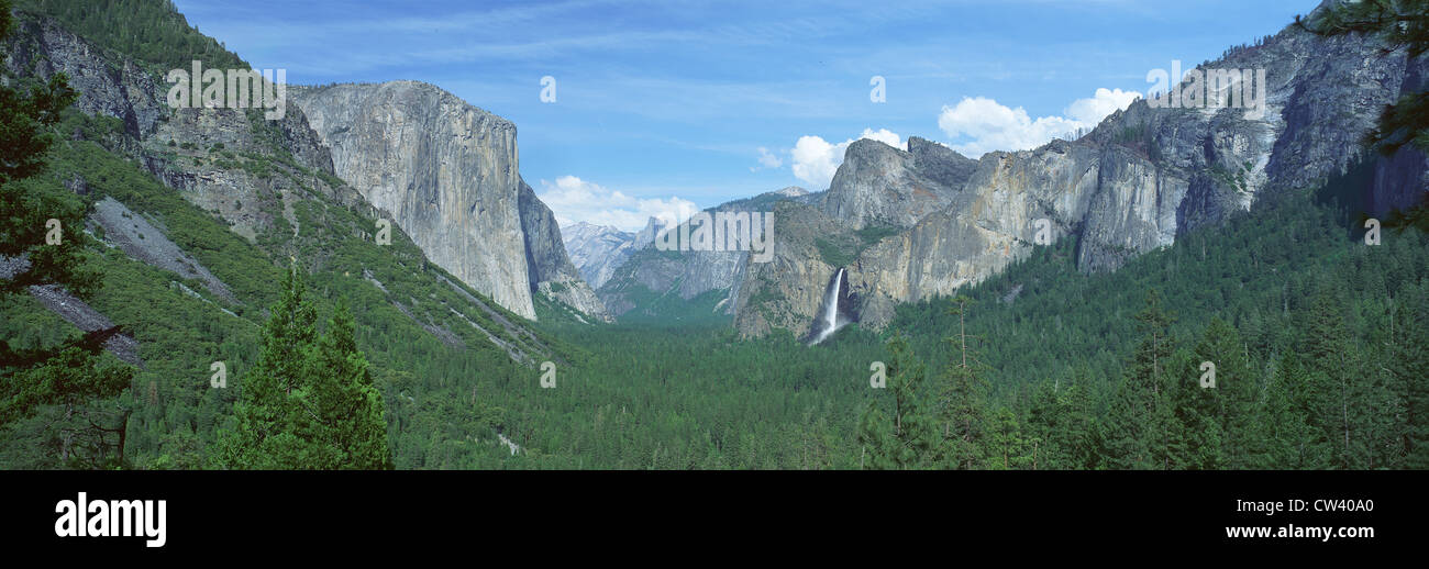 This is a view of Bridal Veil Falls, Half Dome and El Capitan. It is a ...