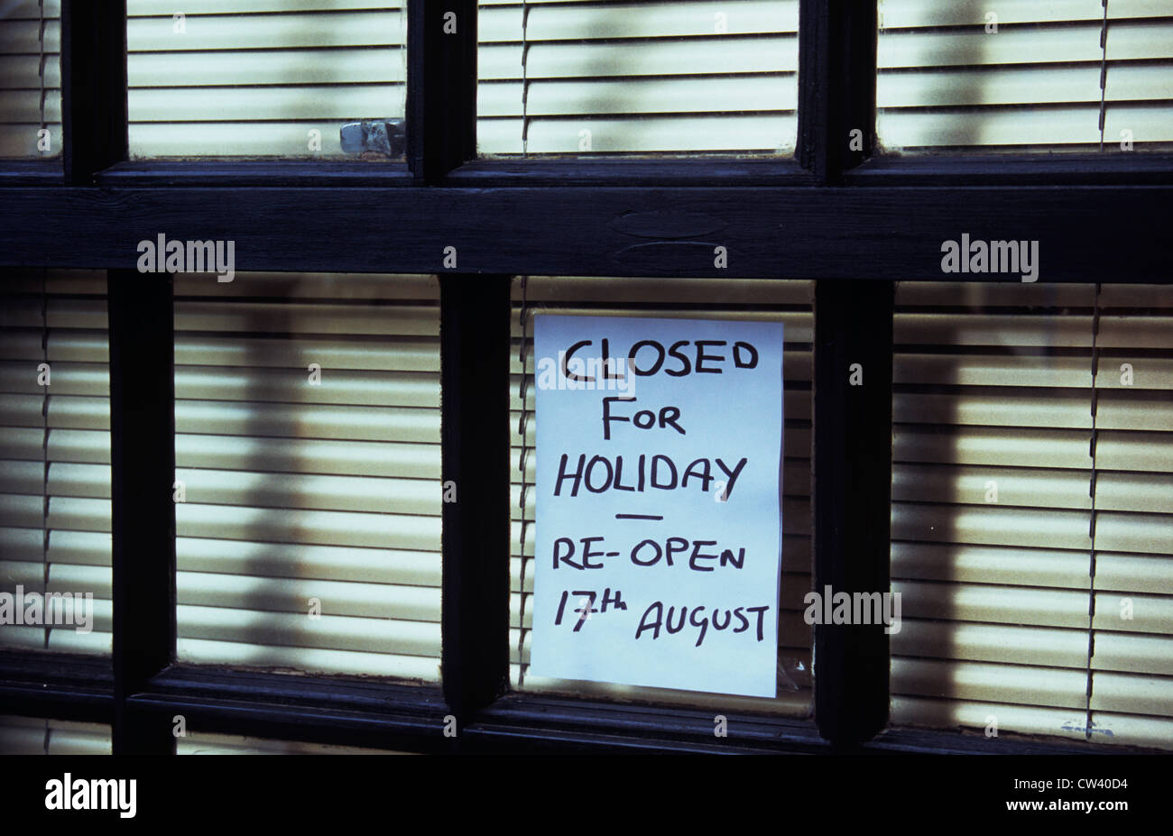 UK England Norfolk Handwritten notice in pane divided window office or ...