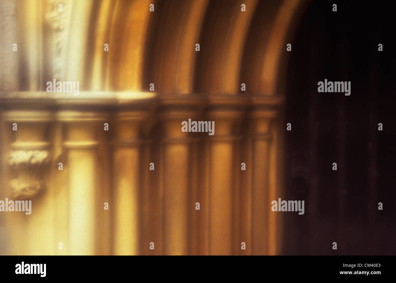 UK, England, Norfolk, Sandstone archway with five slender pillars in ...