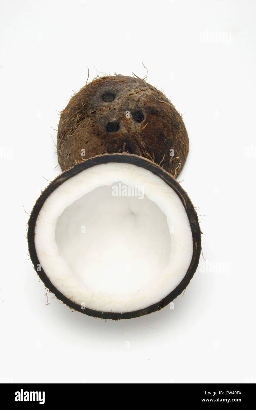 Close-up of two halves of a coconut Stock Photo - Alamy