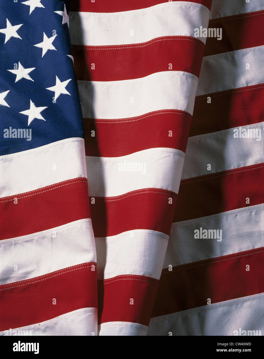 This folded American flag showing stars against their blue field in ...