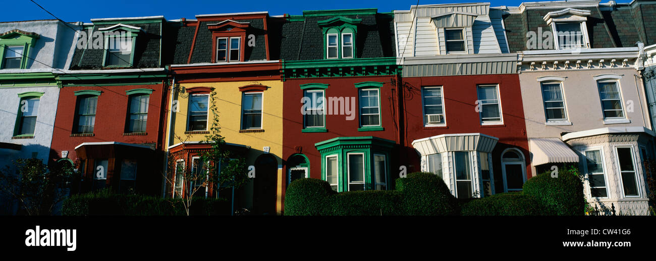 These are typical urban style row houses. They are all lined up next to ...
