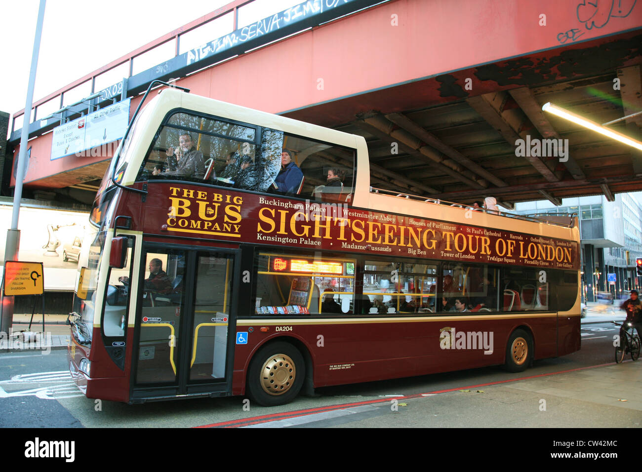 London Sightseeing bus. Tourists love open-top tour bus enable them, a ...