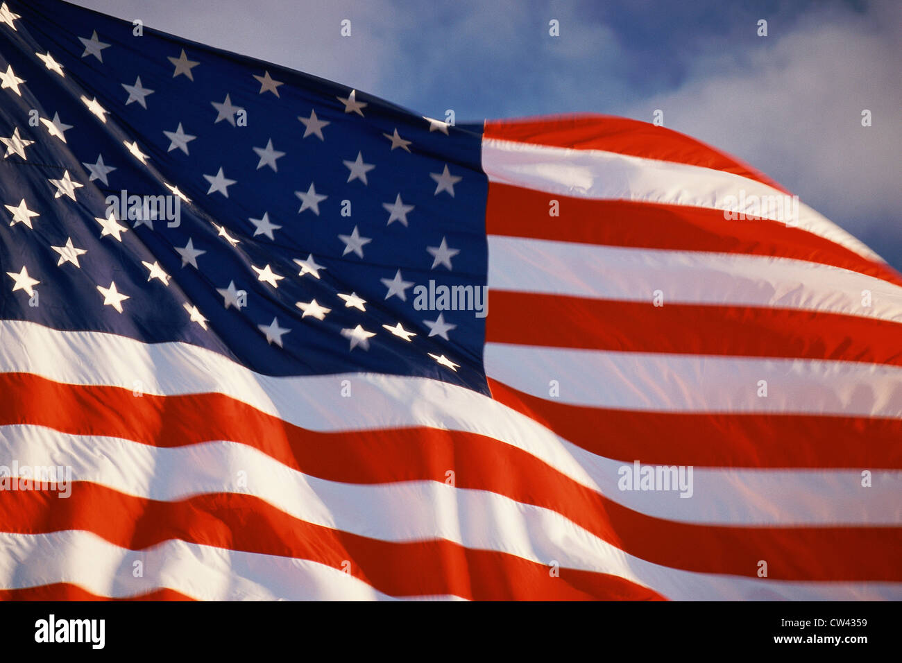 American flag waving in wind Stock Photo - Alamy