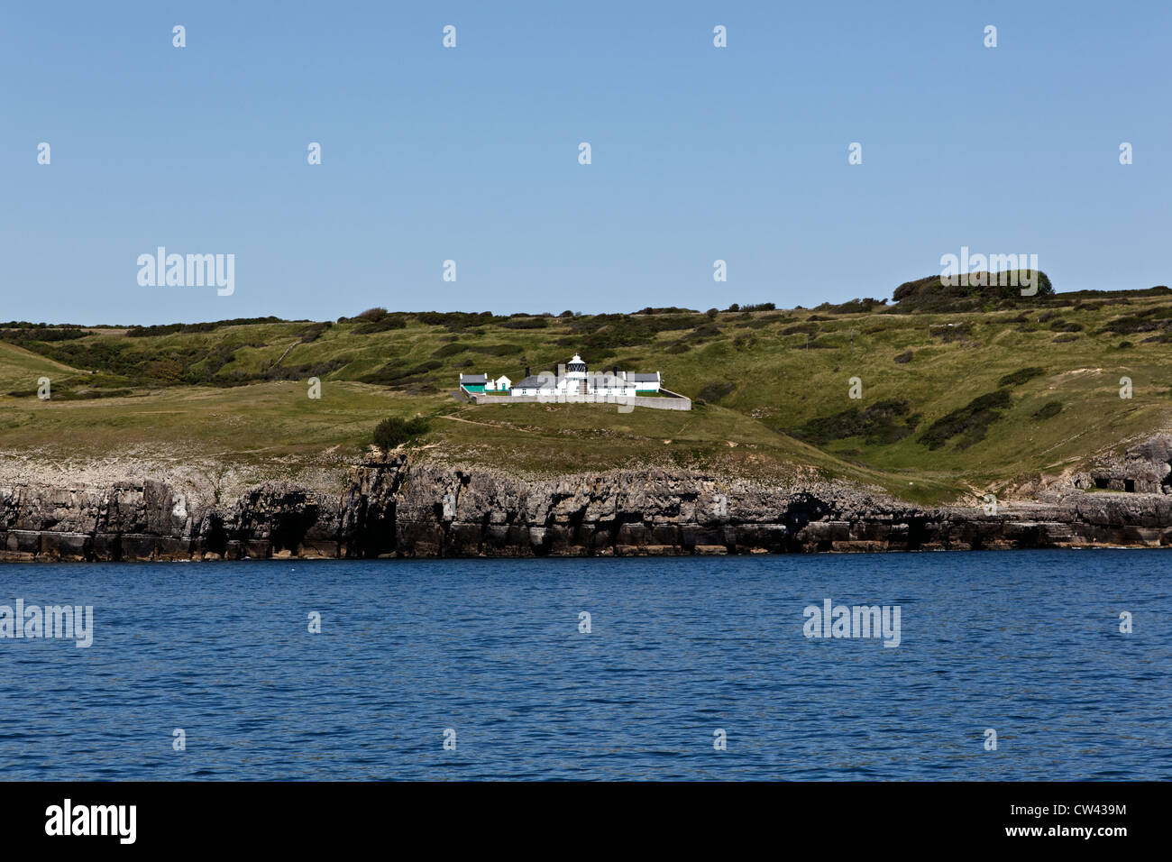 Anvil point Lighthouse on the Jurassic Coast viewed from the sea Stock ...