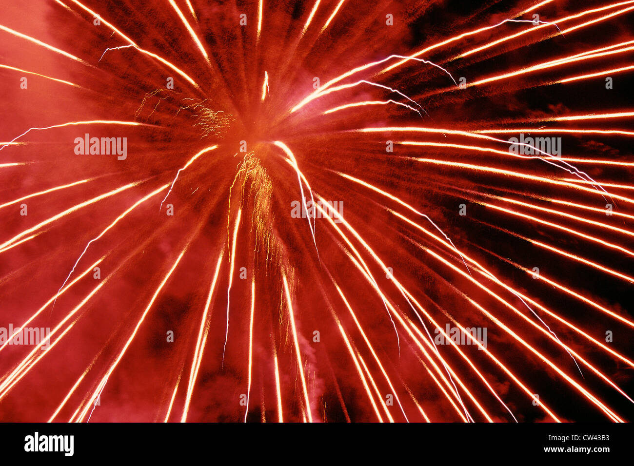 Exploding red fireworks Stock Photo - Alamy