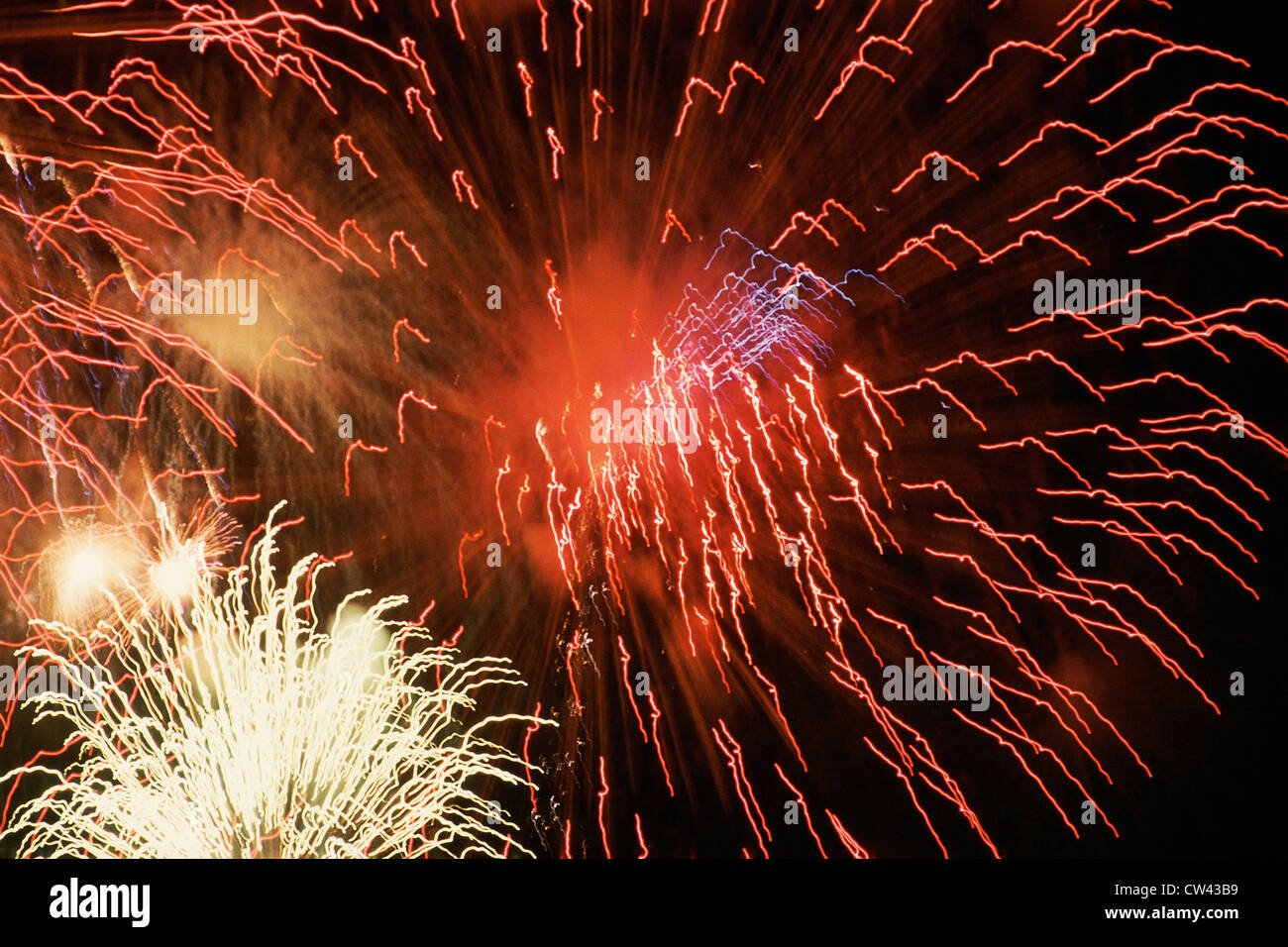 Exploding fireworks in sky Stock Photo - Alamy