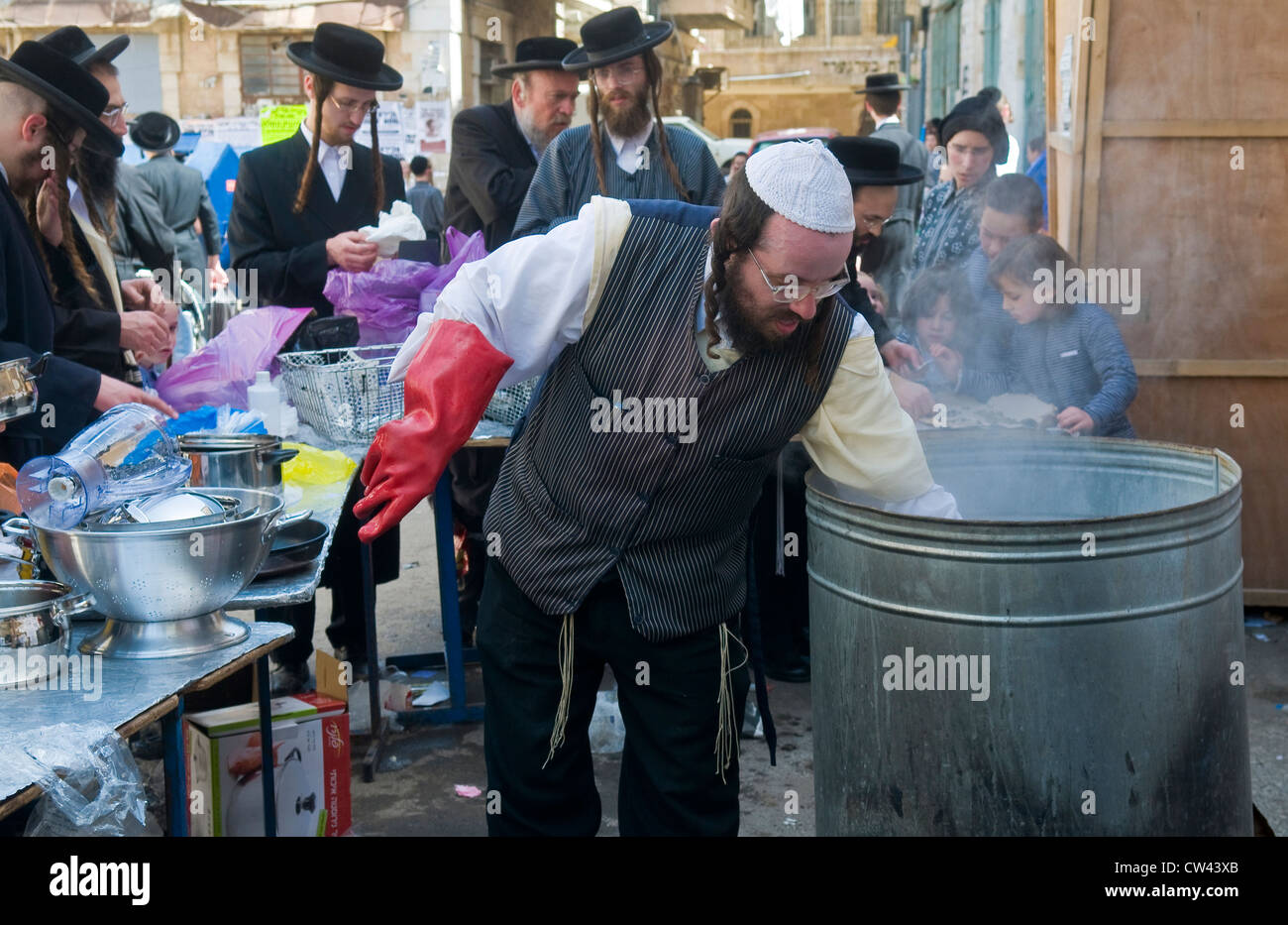 An Ultra Orthodox man is preparing to the Jewish holiday of Passover by ...