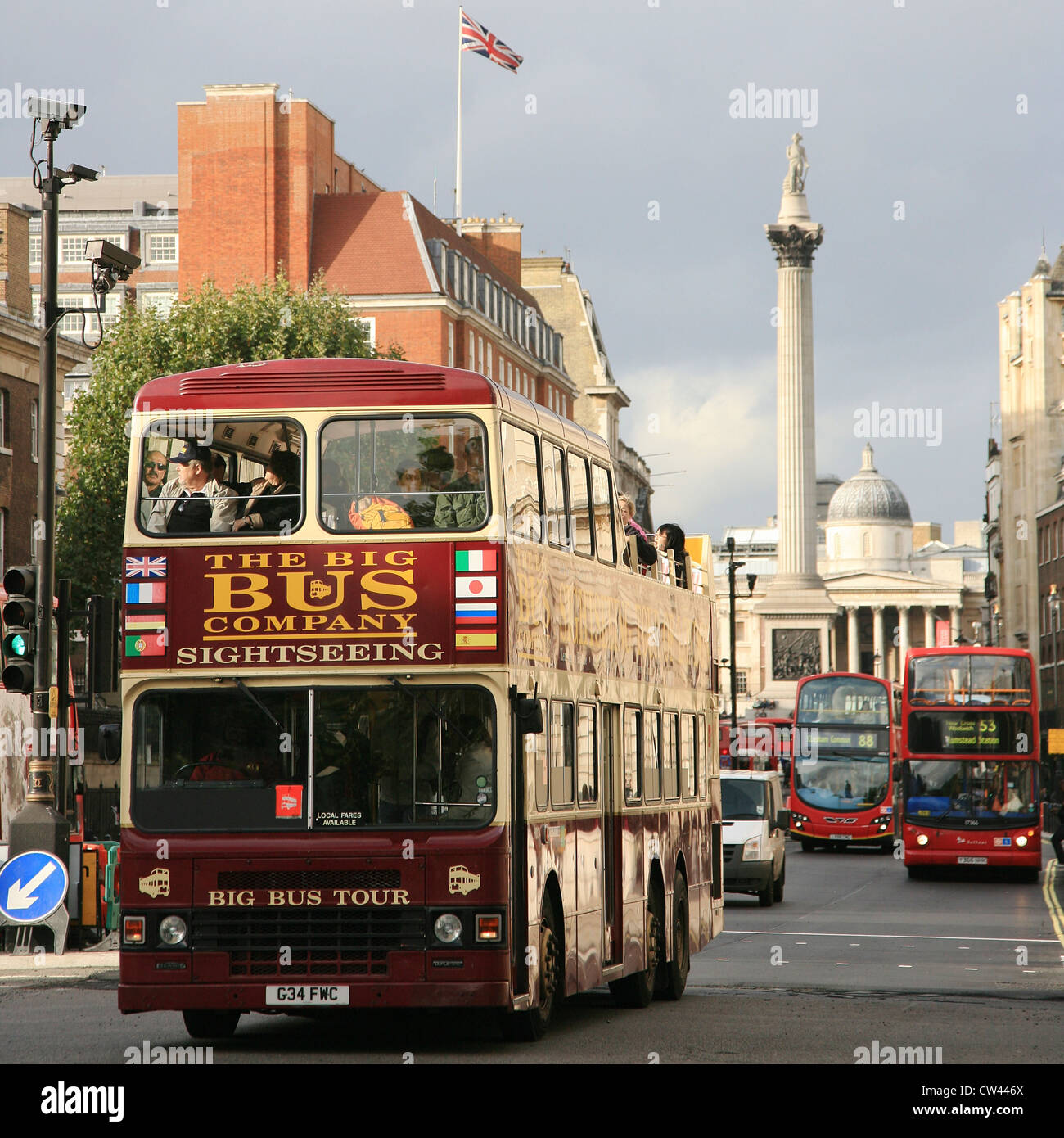 London Sightseeing bus. Tourists love open-top tour bus enable them, a ...